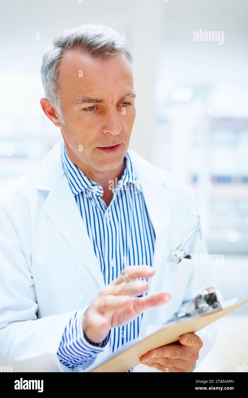 Health, question and consulting with doctor and clipboard, chart or ...