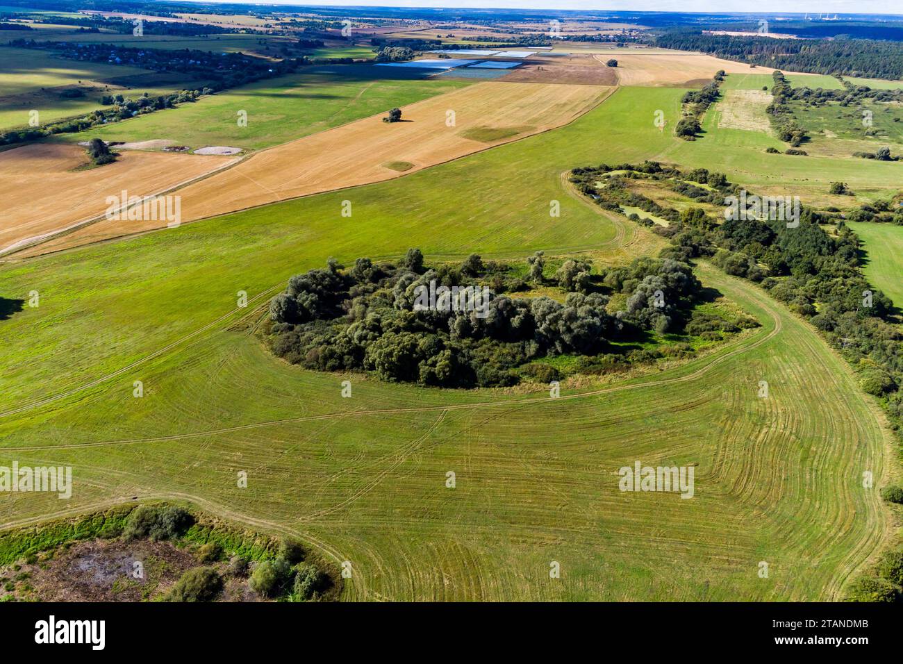 Flight over endless rural fields with occasional marshy areas Stock ...