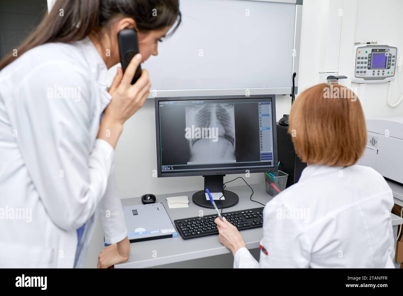 Chest, lung x ray on a doctor's computer screen on a desk. Female ...