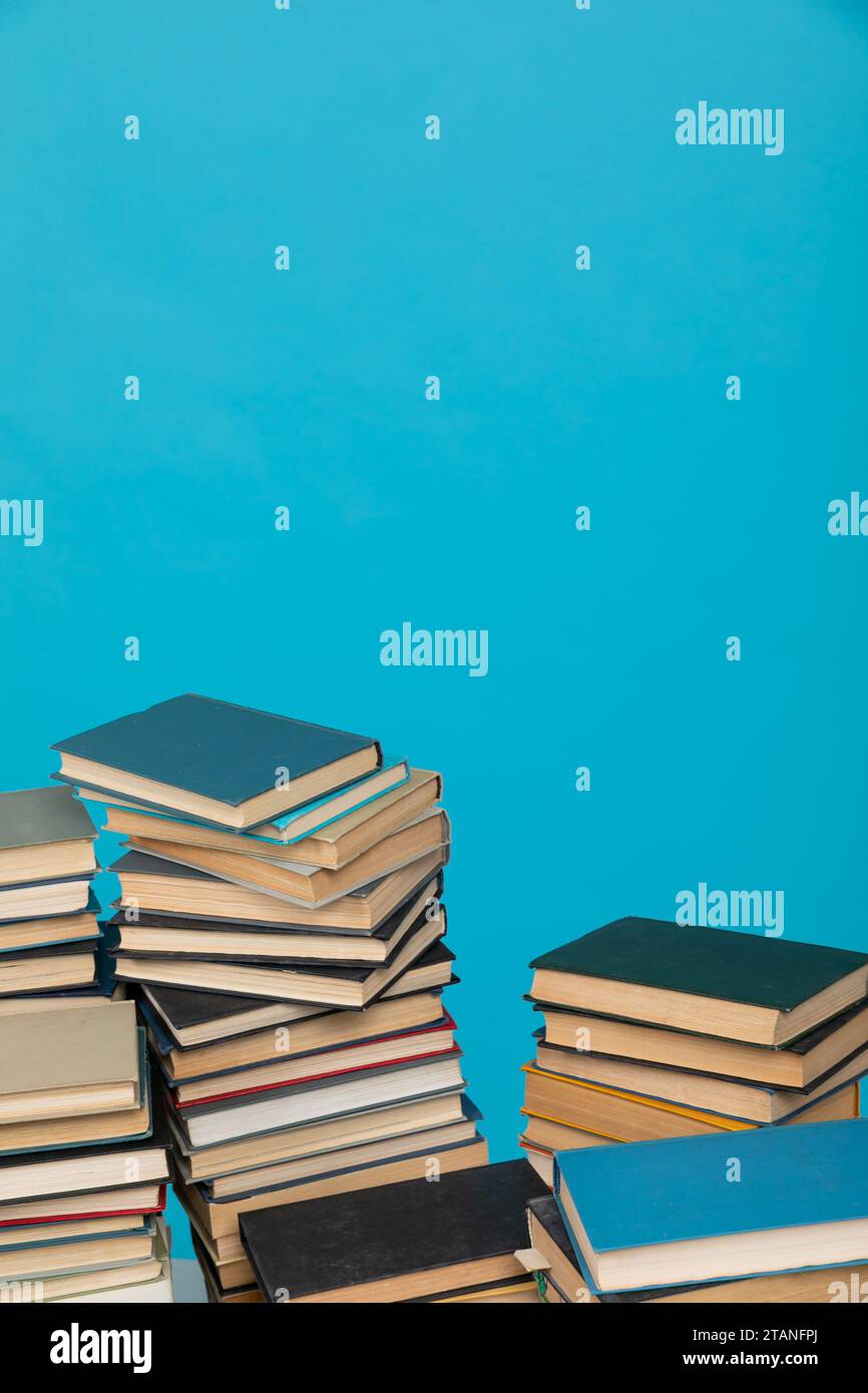 Stacks of books for learning in the school library Stock Photo - Alamy