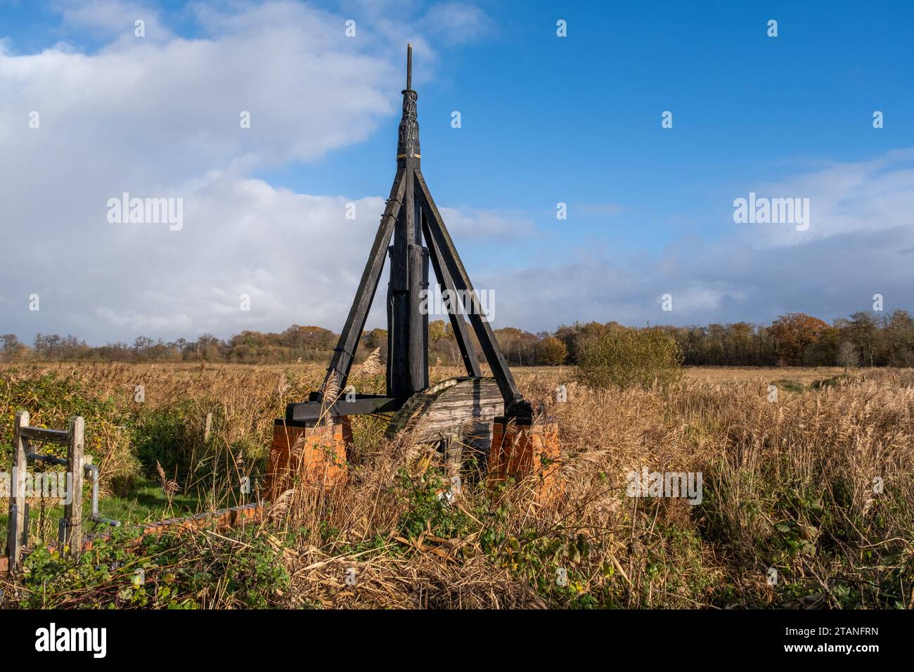 Old, disused and abandoned drainage pump on the riverbank Stock Photo ...