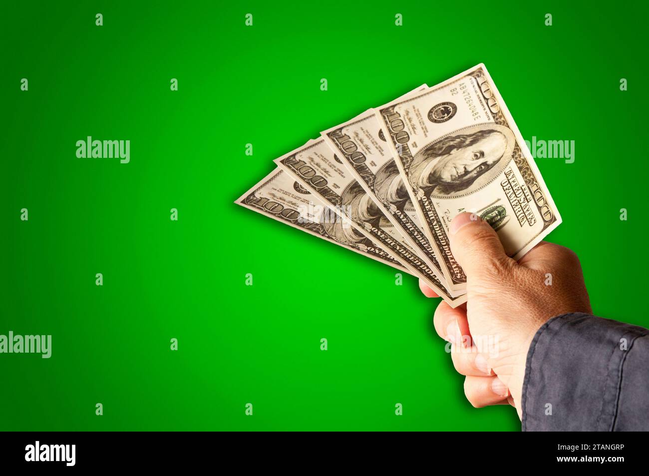 man holding a bunch of 100 dollar banknotes Stock Photo - Alamy