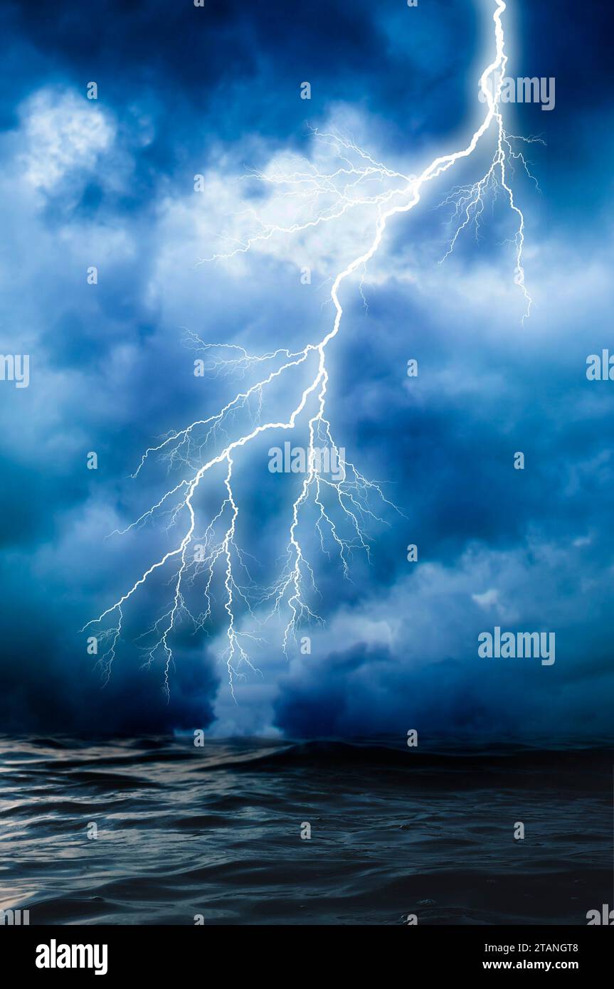ocean waves with dark stormy sky and lightning Stock Photo - Alamy