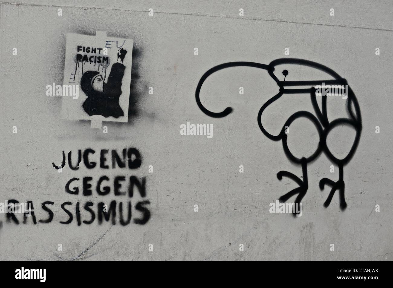 Graffiti on a house wall-youth against racism Stock Photo - Alamy