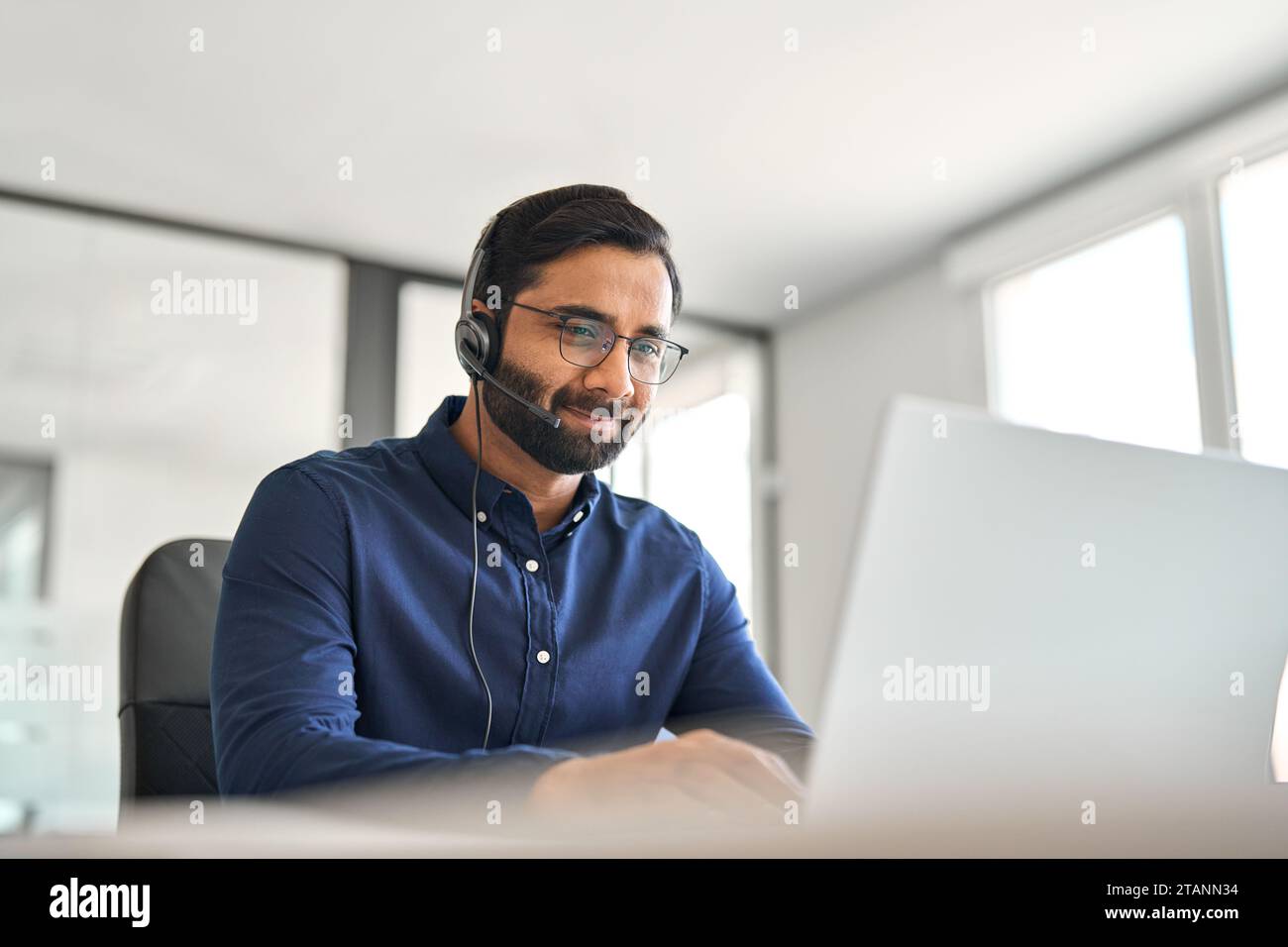 Indian businessman wearing headset hi-res stock photography and images ...