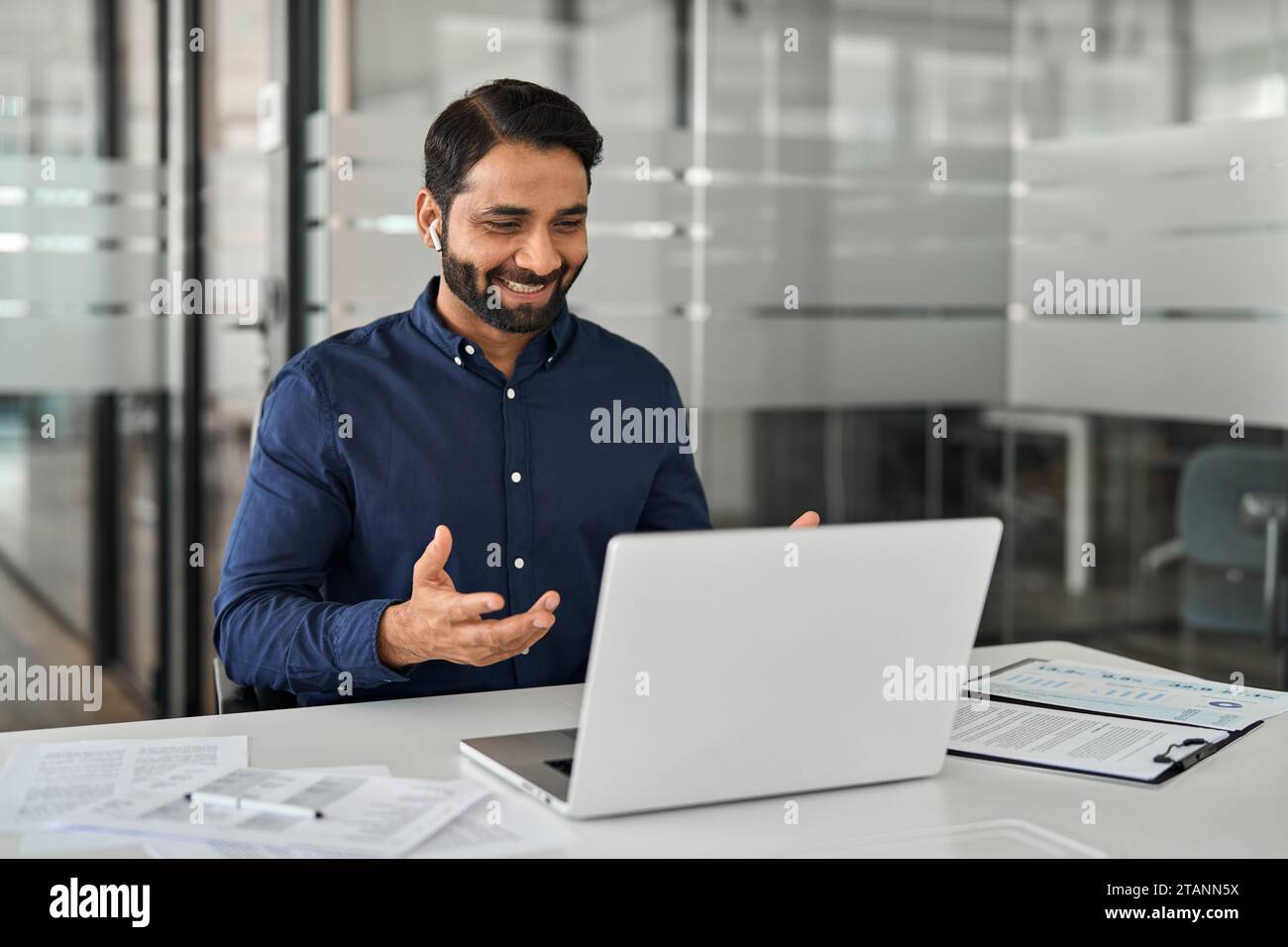 Happy Indian business man hr talking having hybrid interview online ...