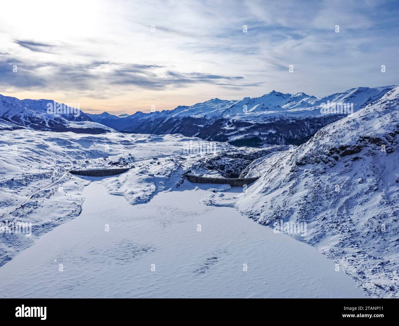 Lake Montespluga and its dam in winter Stock Photo - Alamy