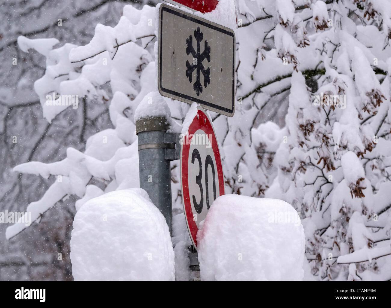 Munich, Germany. 02nd Dec, 2023. Snow-covered traffic signs at a ...