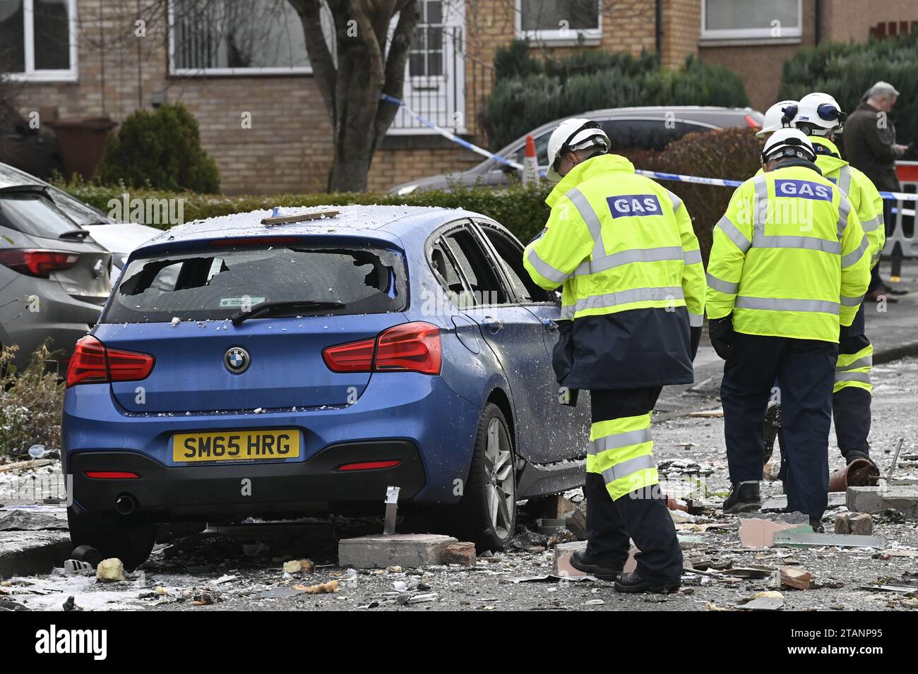 Gas engineers and police officers at the scene on Baberton Mains Avenue ...