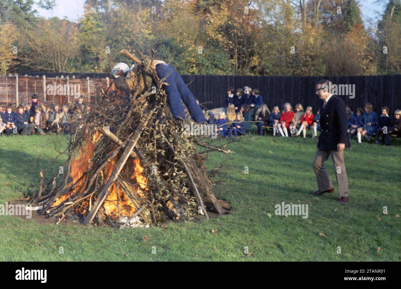 1970s schoolchildren and teacher at unknown British school watching a ...