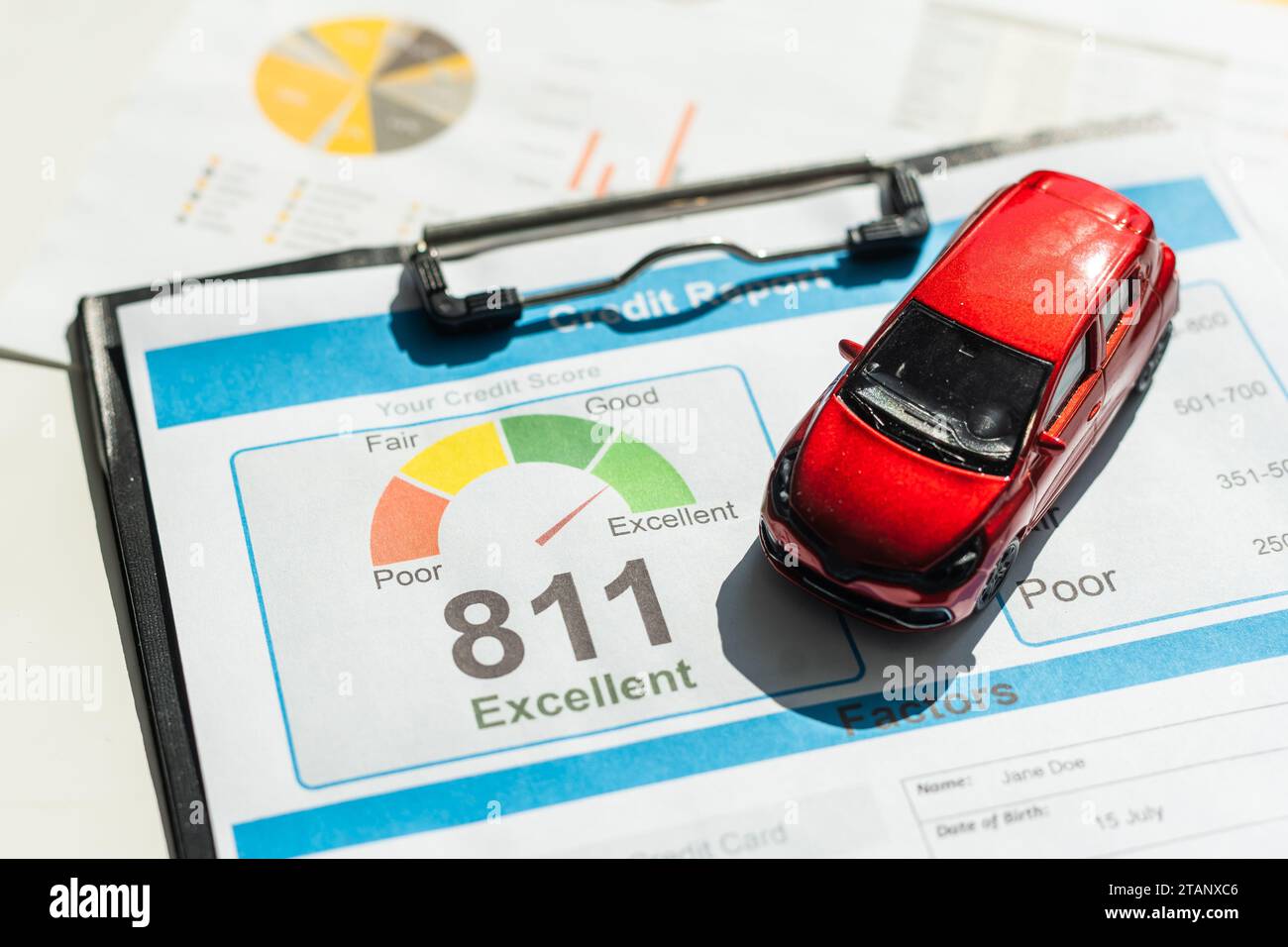 Miniature Blue Car and Checklist Stock Photo - Alamy
