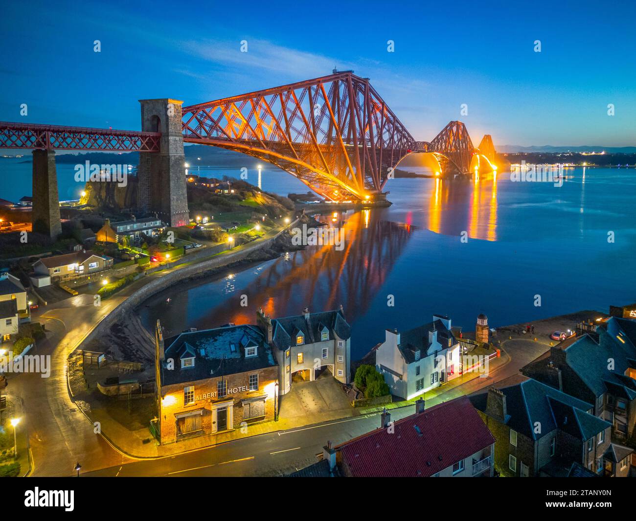 Aerial view from drone at night of North Queensferry village beside the ...