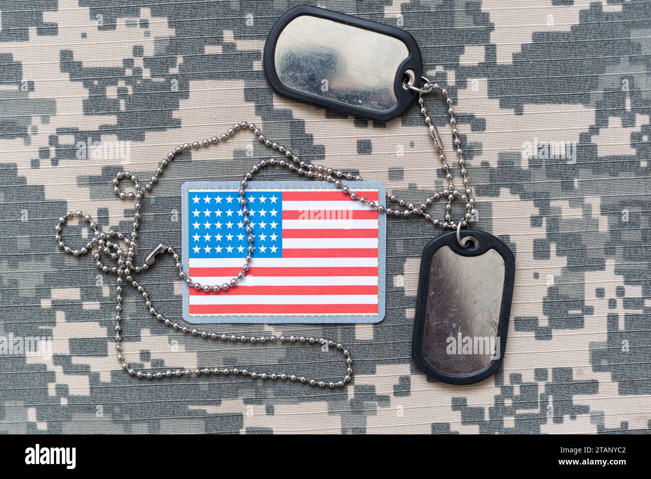 Military ID tags with USA flag on uniform background Stock Photo - Alamy