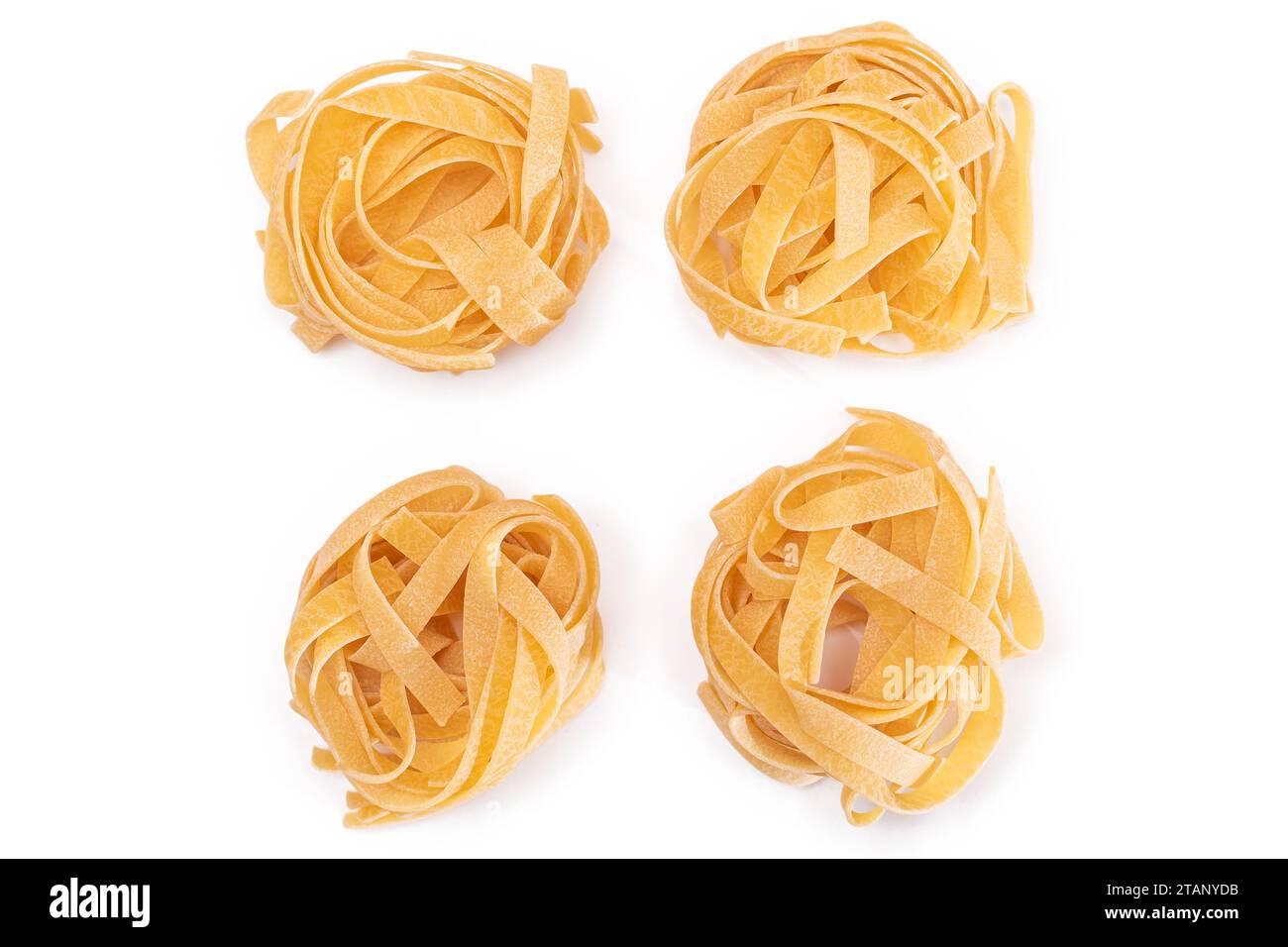 Four Classic Italian Raw Egg Fettuccine - Isolated on White Background ...