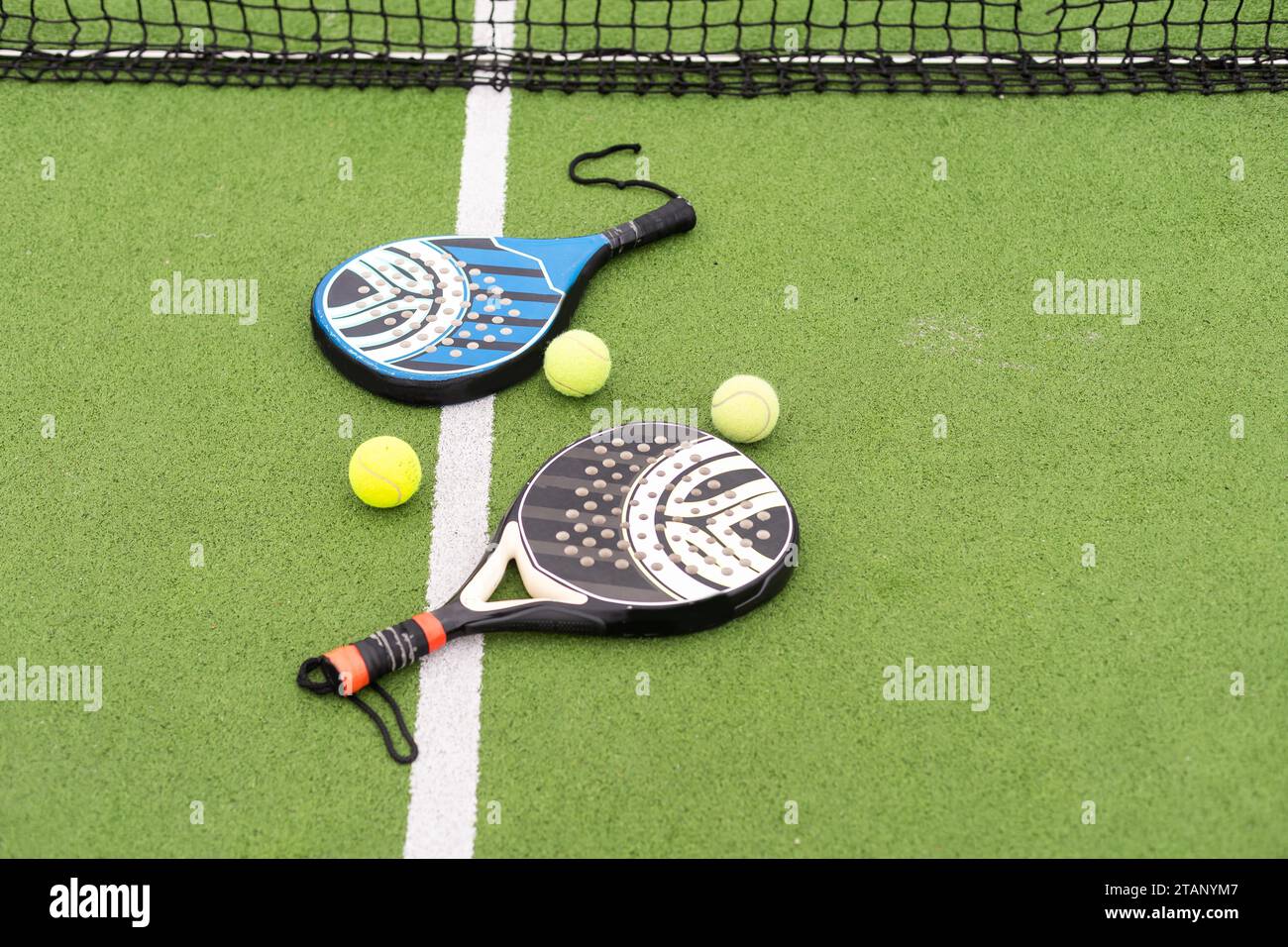 paddle sport on the paddle court, ball, rackets Stock Photo - Alamy
