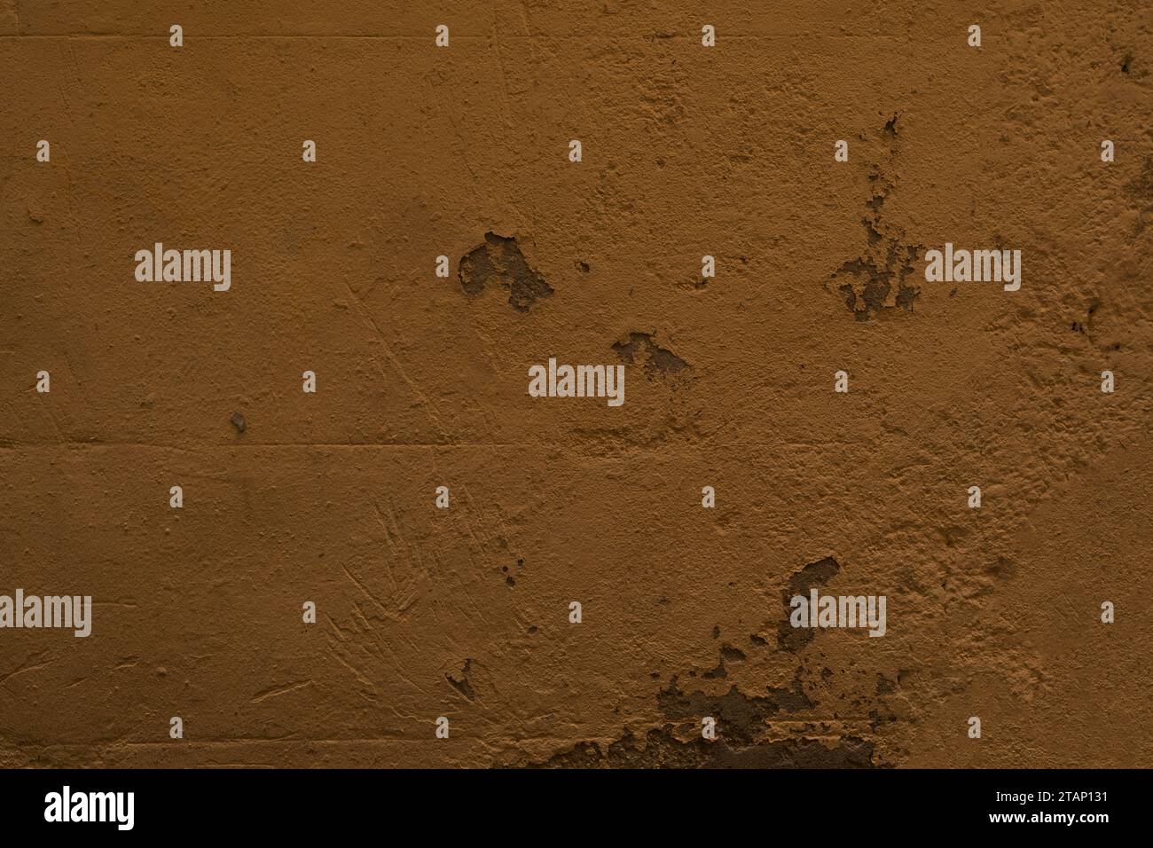 dark ocher plaster wall of old mediterranean city, texture background ...