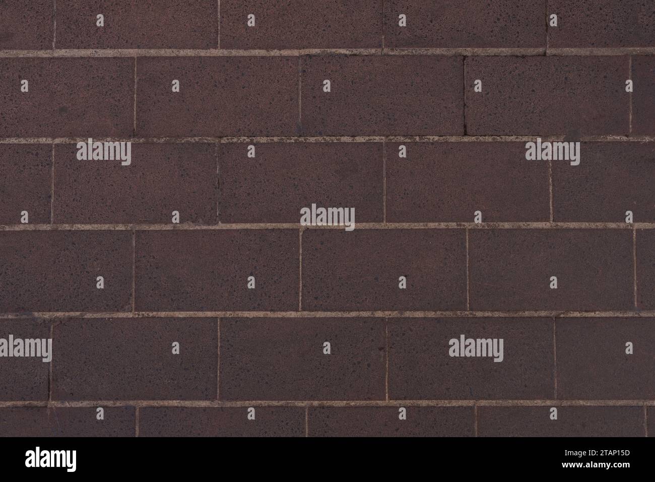 Reddish stone tile on pavement outdoor, backdrop Stock Photo - Alamy