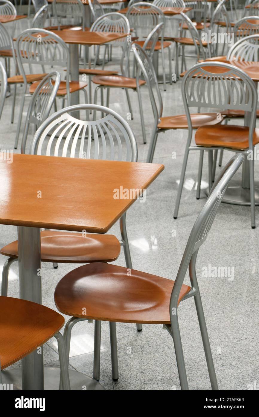Empty cafe or restaurant, rows of tables and chairs, perspective point ...