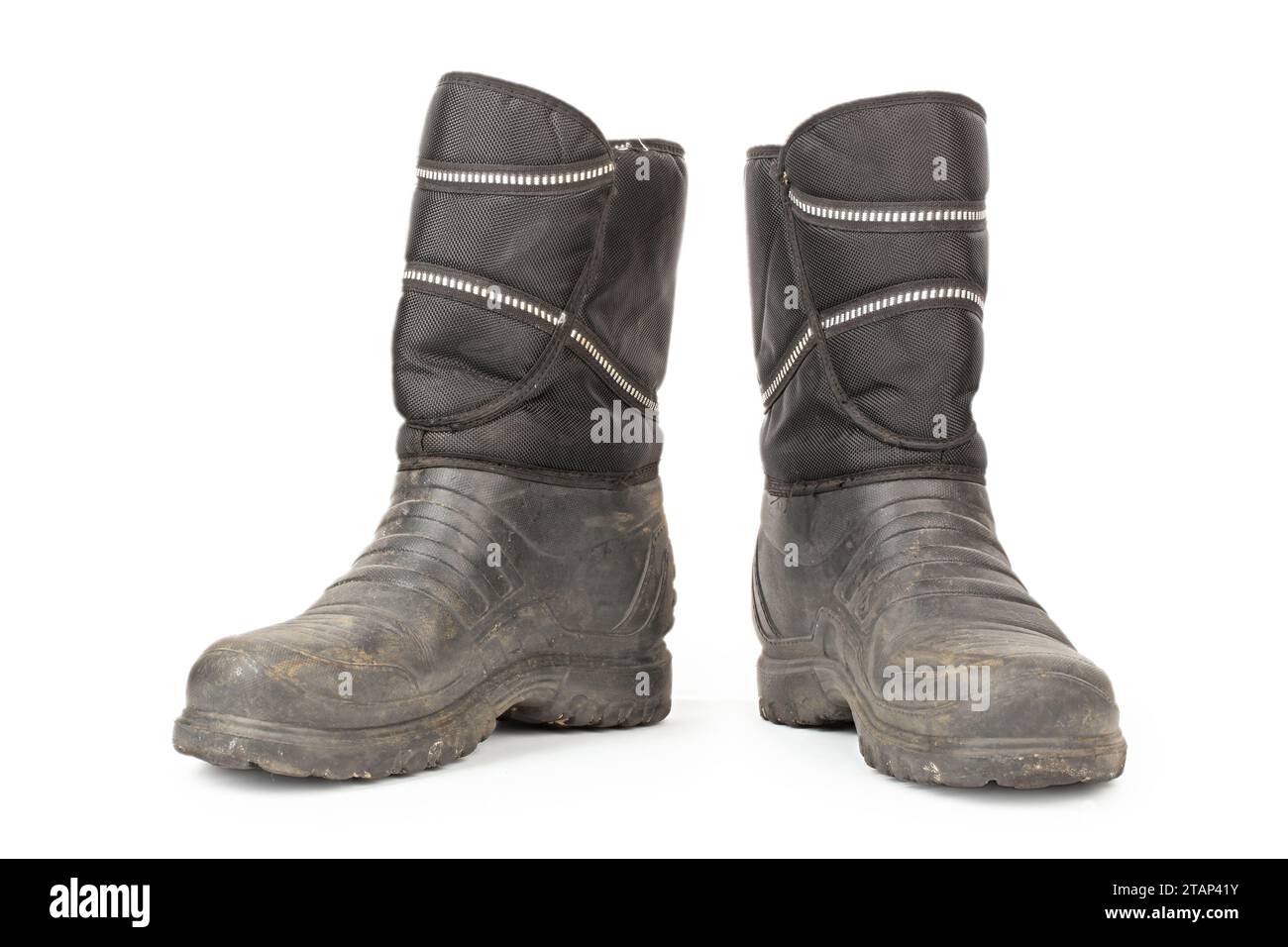 Dirty insulated old boots on a white background. Hiking boots. File ...