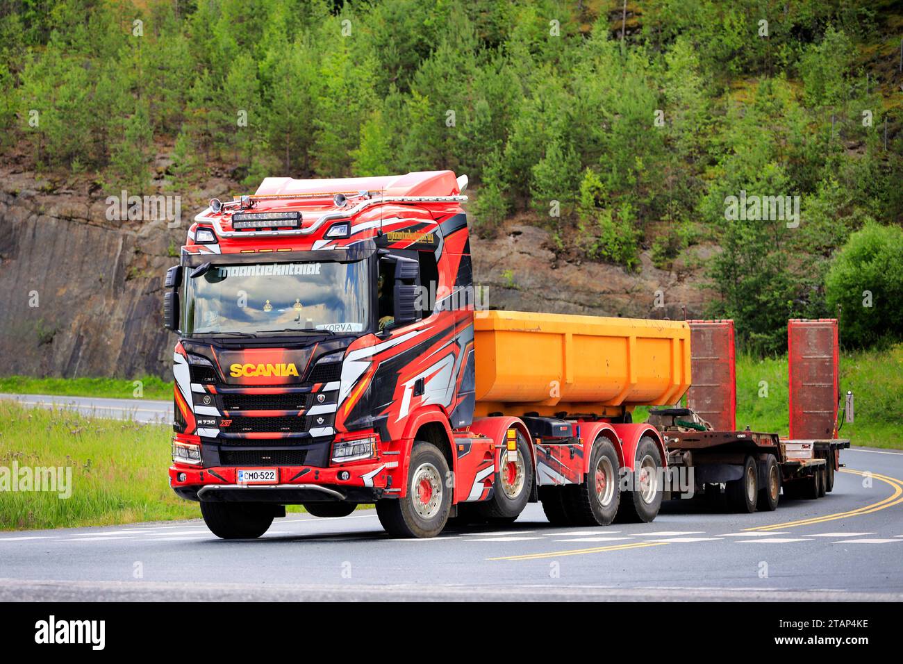 New Scania R730 XT truck Maantiekiitajat Oy in front of trailer at ...