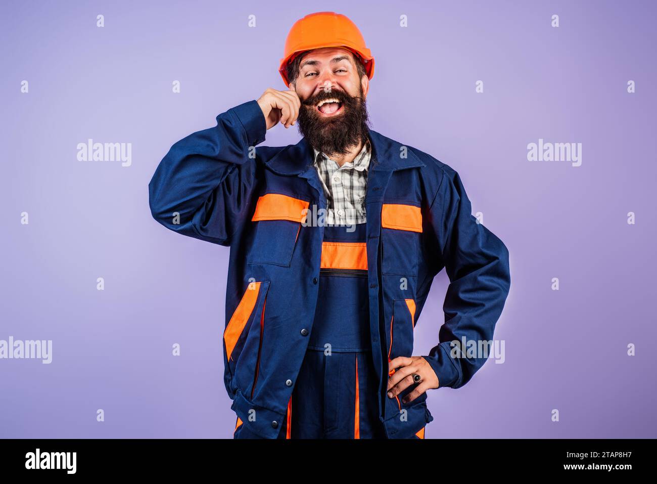 Builder worker in construction helmet. Builder foreman or repairman in ...