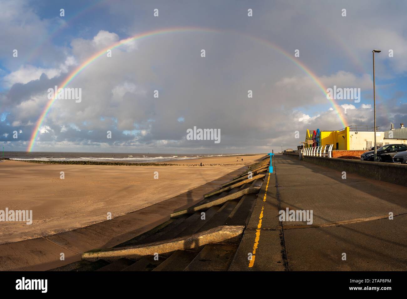 Rainbow over the beach and promenade at Prestatyn, North Wales Stock ...