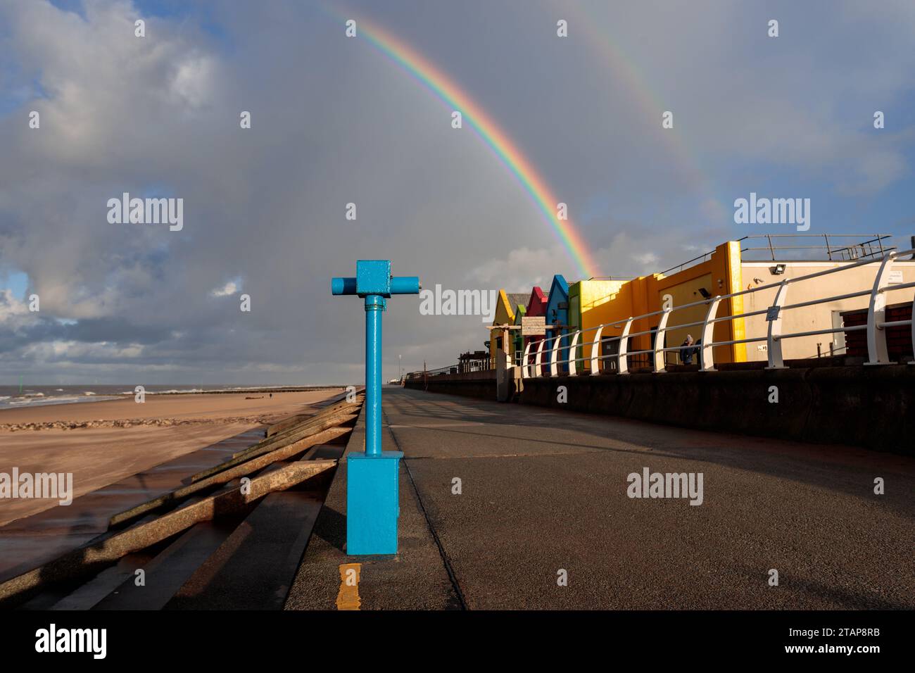 Rainbow over the beach and promenade at Prestatyn, North Wales Stock ...