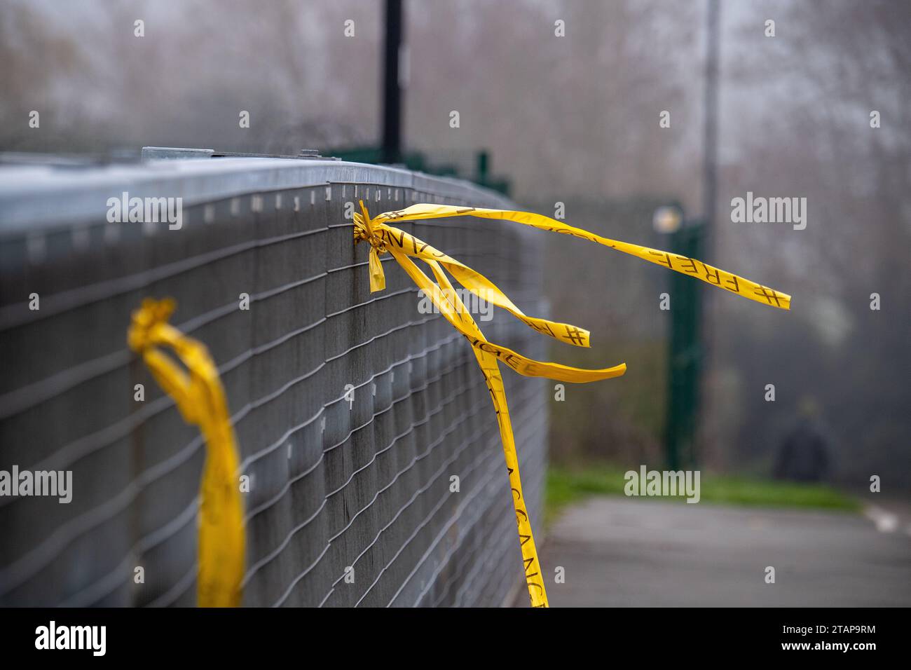 Slough, Berkshire, UK. 2nd December, 2023. Free Assange yellow ribbons ...