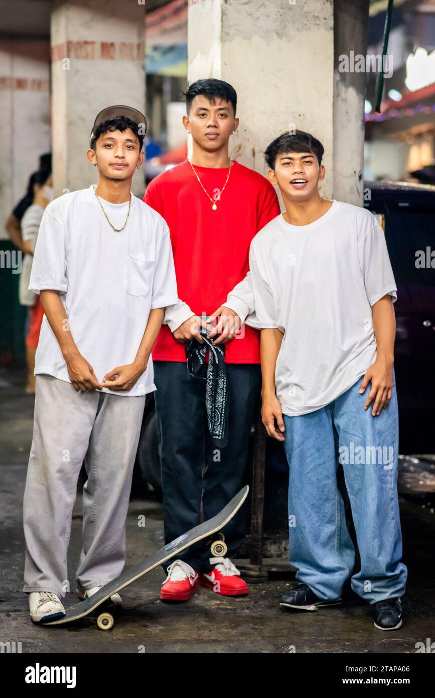 Three young teenage boys strike a pose in Manila, The Philippines Stock ...