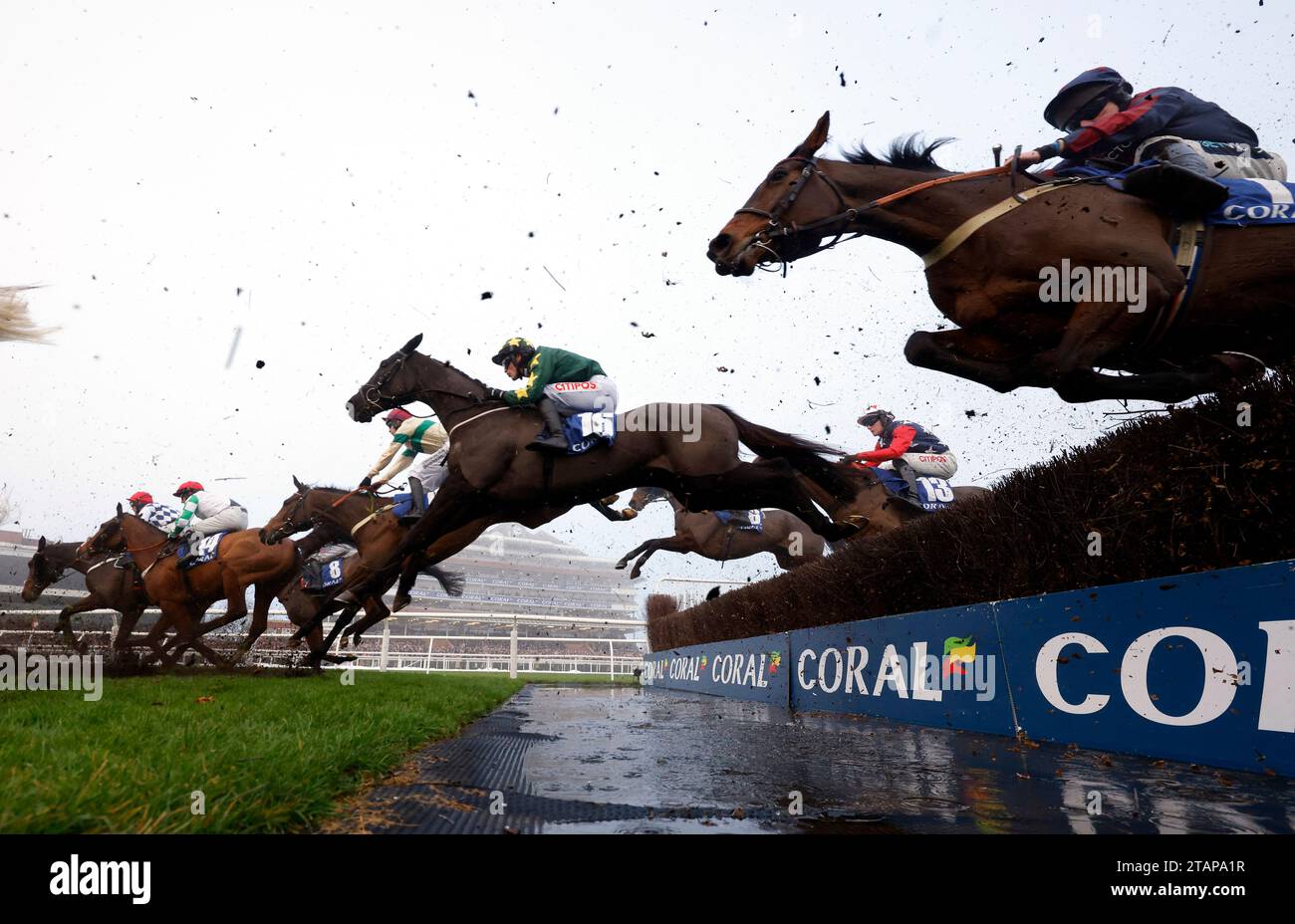 Runners and riders during the Coral Gold Cup Handicap Chase on Coral ...