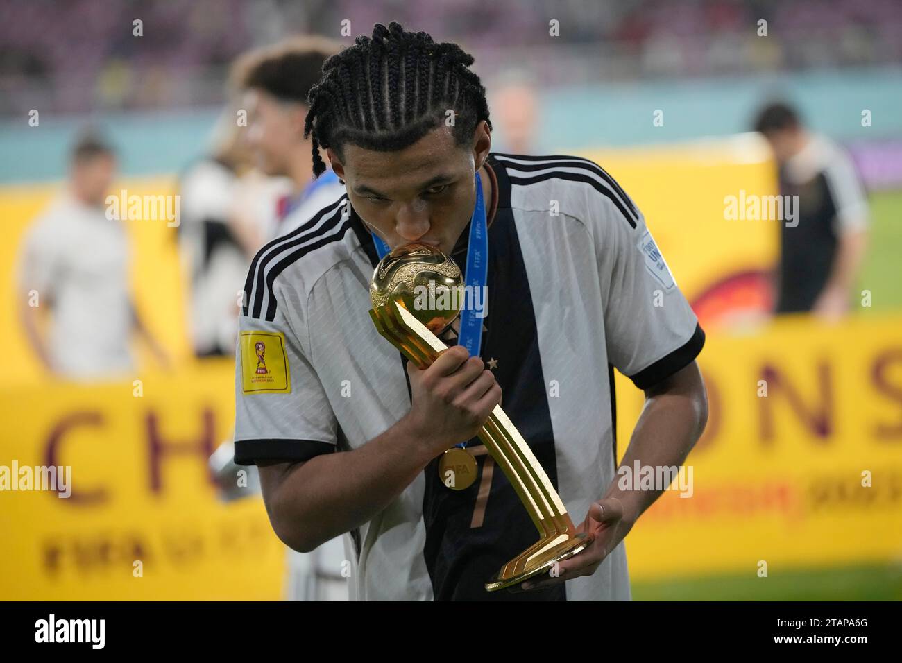 Germany's Paris Brunner kisses his Golden Ball trophy as he celebrates ...