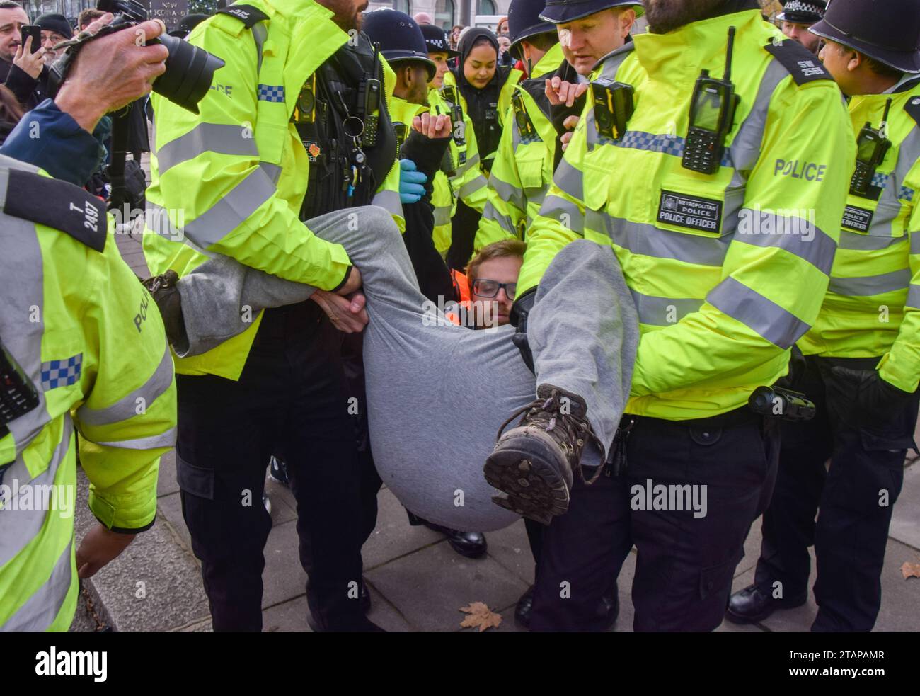 London, UK. 2nd December 2023. A Just Stop Oil activist is arrested ...