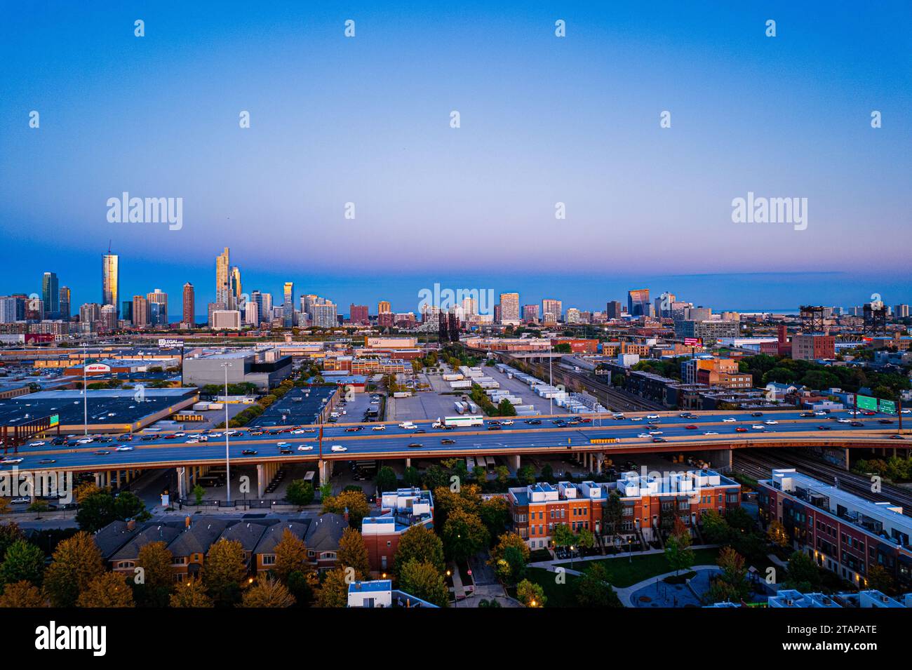 Aerial view of I-90 next to downtown Chicago driving by the Chicago ...