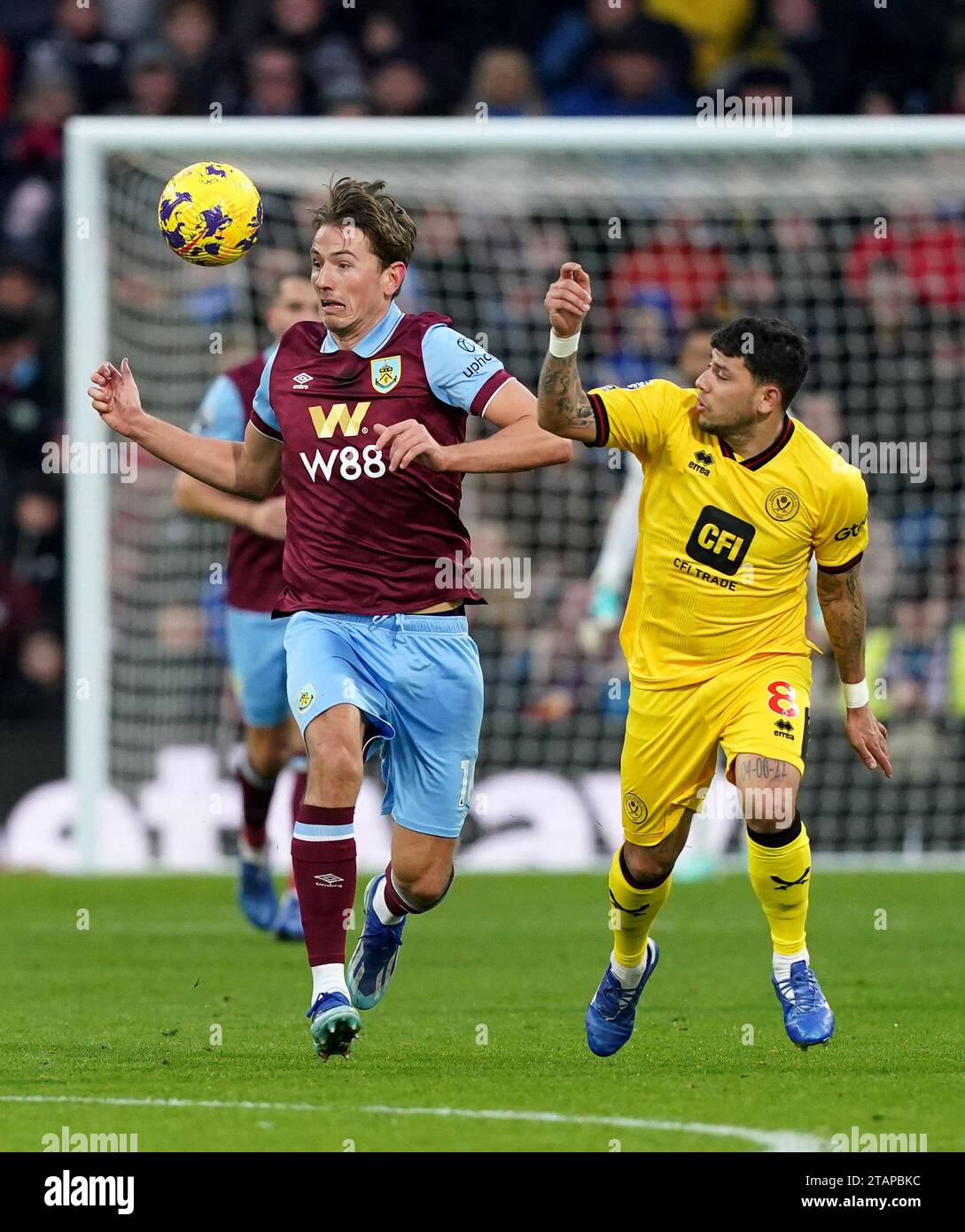 Burnley's Sander Berge (left) and Sheffield United's Gustavo Hamer ...