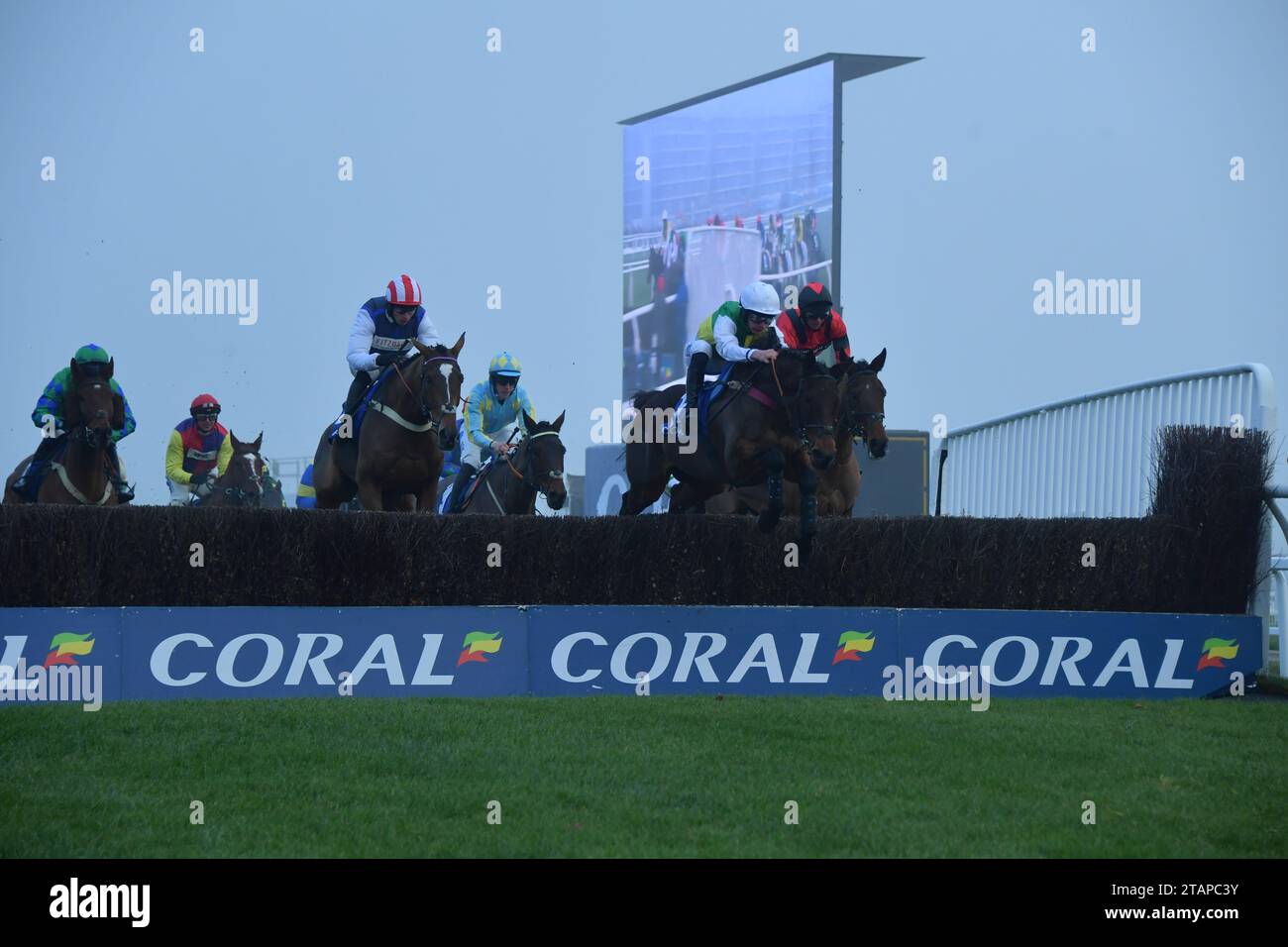 Newbury, UK. 2nd December 2023. Cloudy Glen (White Cap) clears the ...