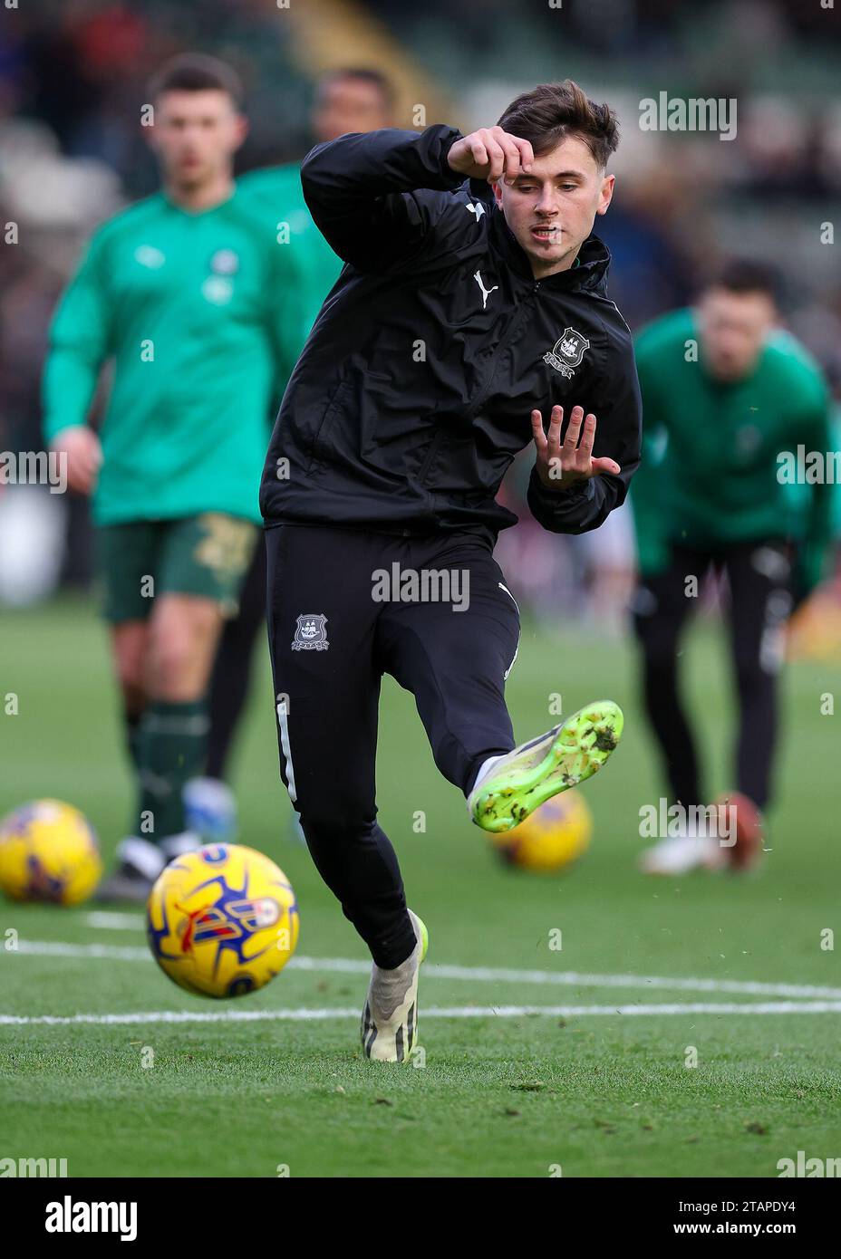 Luke Cundle #28 of Plymouth Argyle warming up during the Sky Bet ...