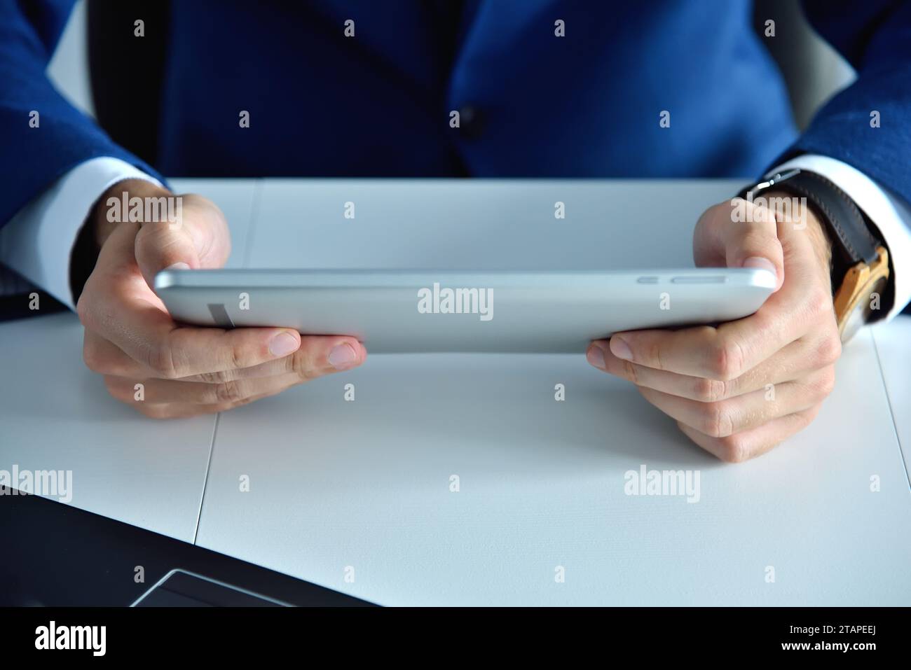 Top view of hands using tablet computer. Business and financial success ...