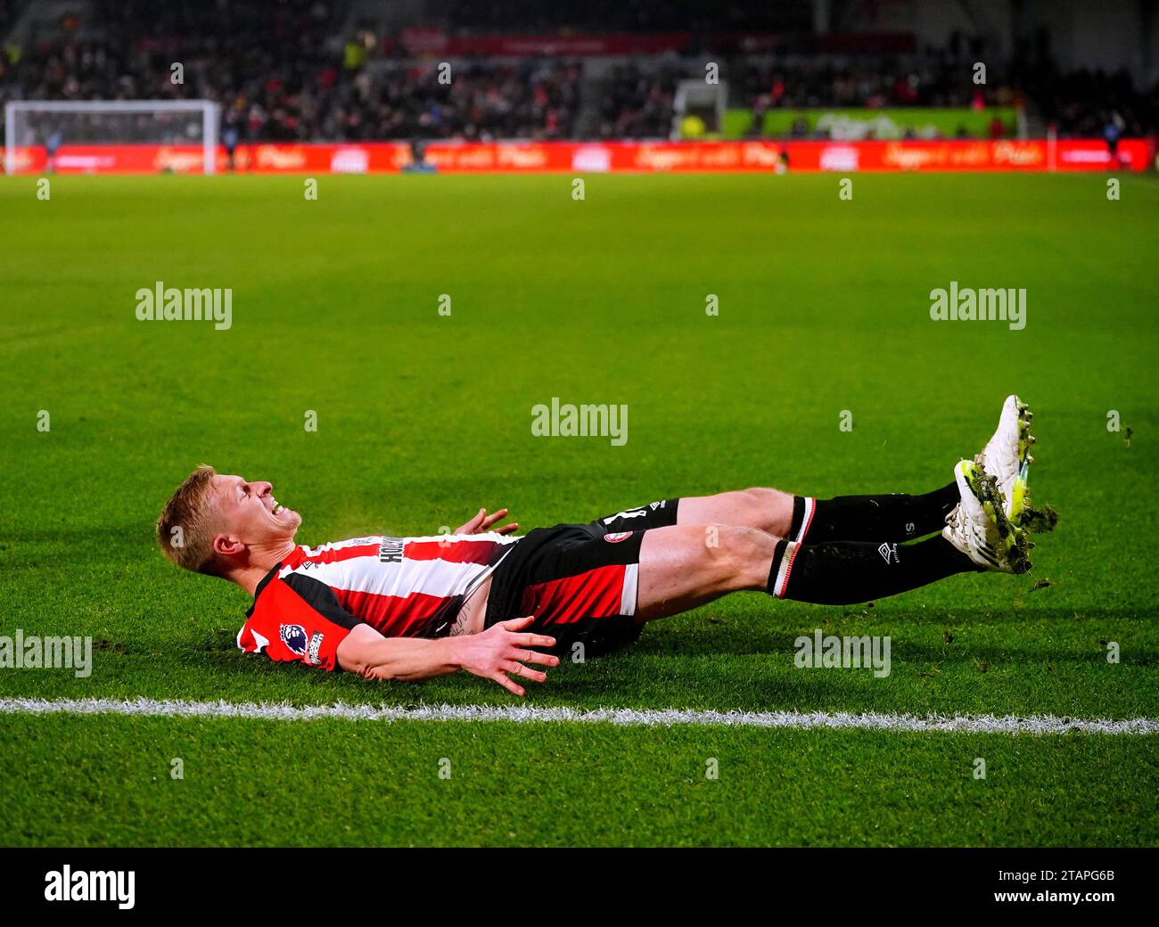 Brentford's Ben Mee celebrates scoring their side's second goal of the ...