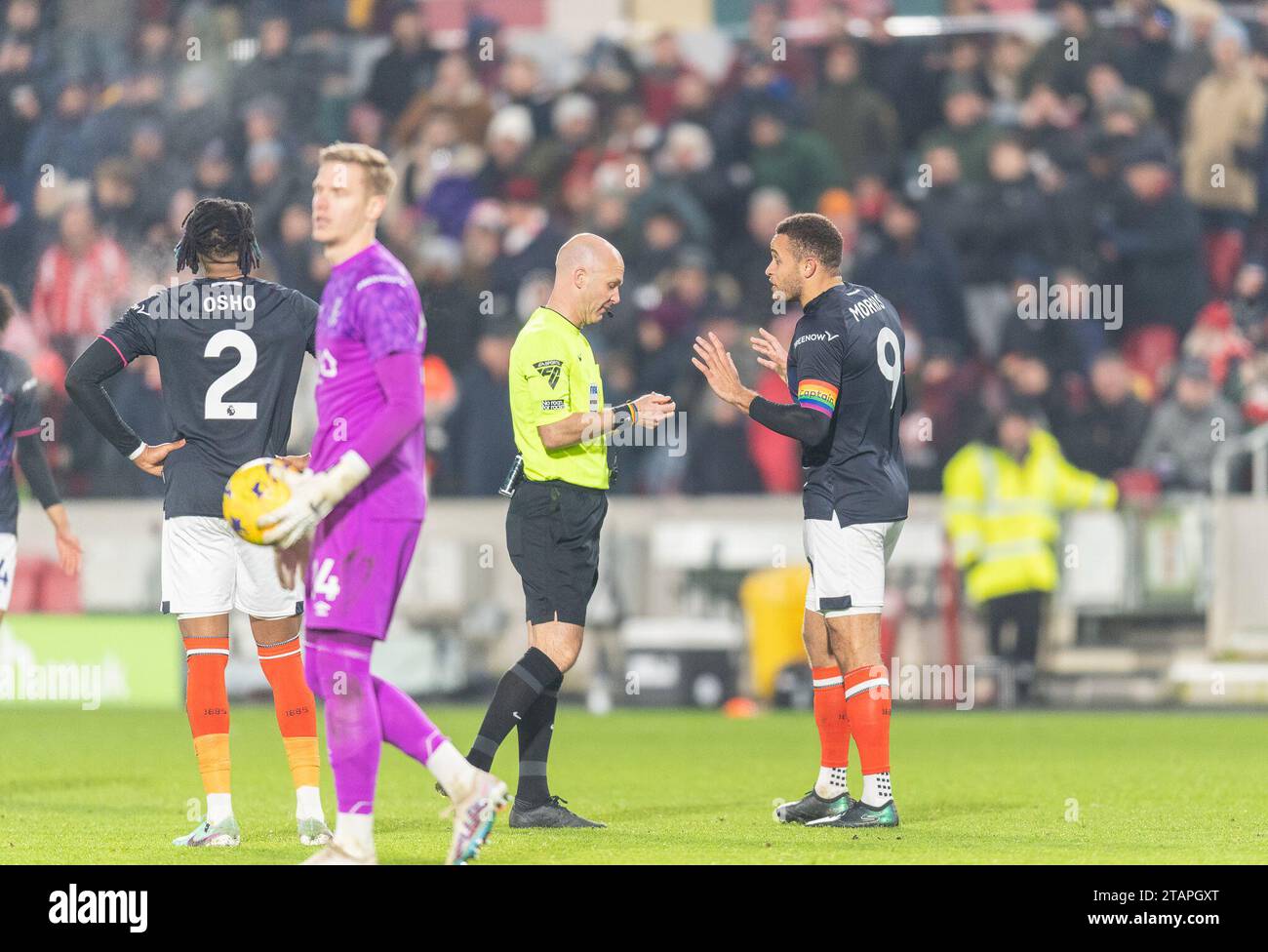 Carlton Morris of Luton Town argues with Referee Anthony Taylor after ...