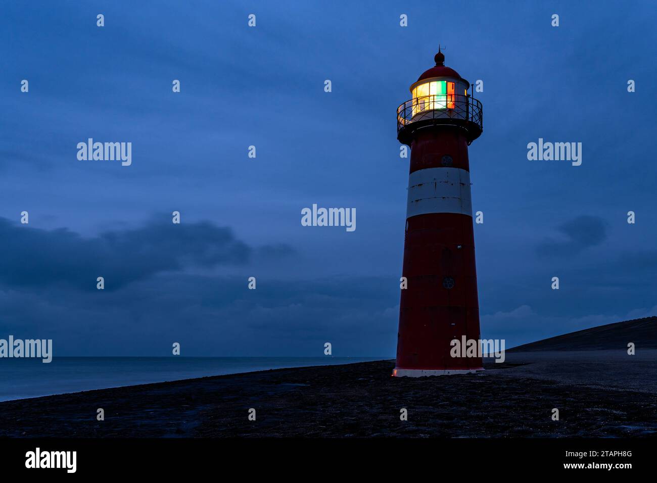 short lighthouse of Westkapelle, Netherlands at dusk Stock Photo - Alamy