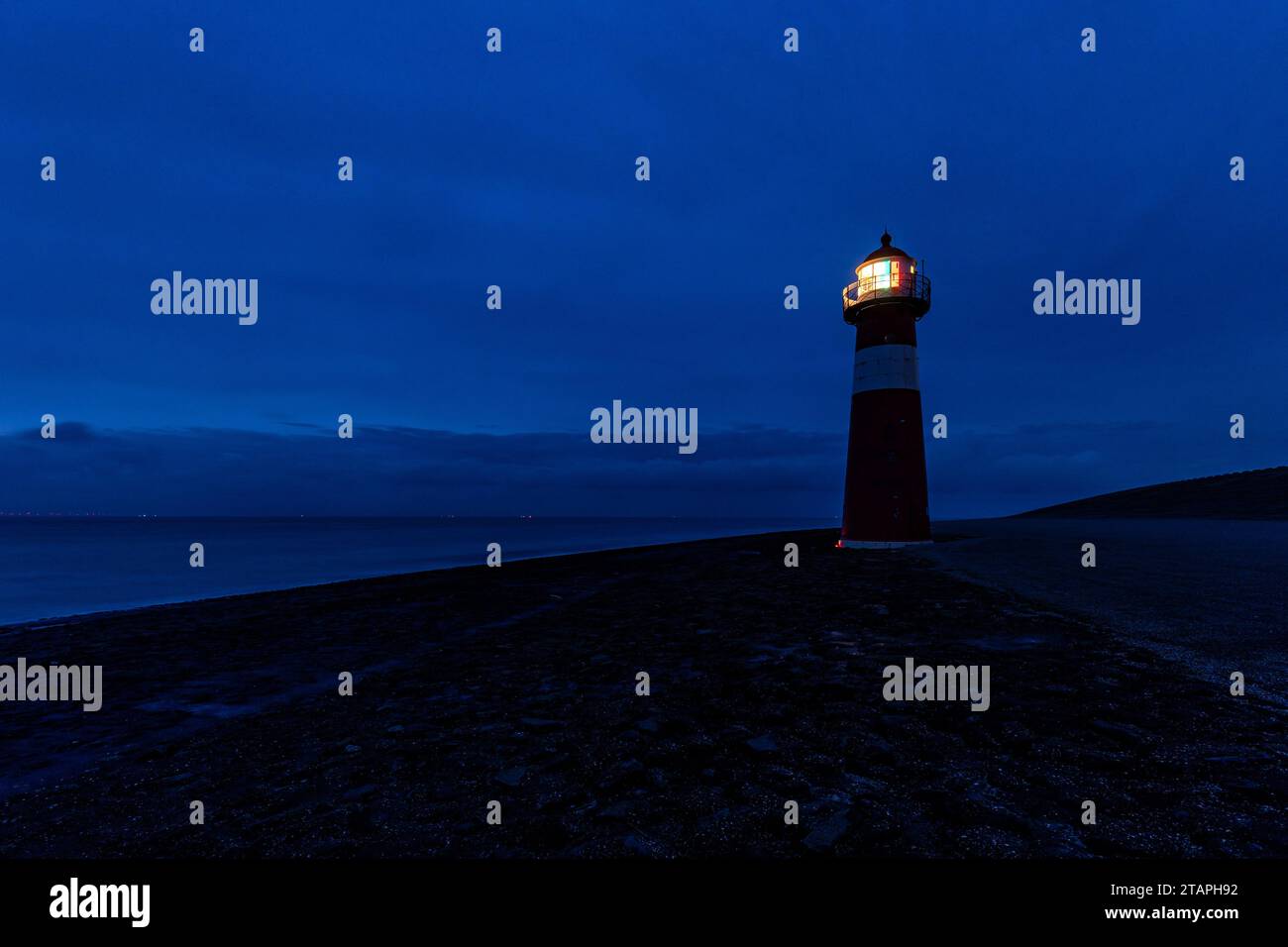 short lighthouse of Westkapelle, Netherlands at dusk Stock Photo - Alamy
