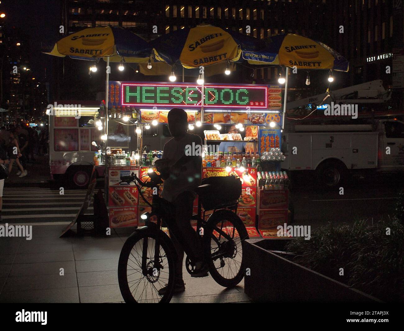 New York City street vendor on a busy Manhattan street corner ready to ...