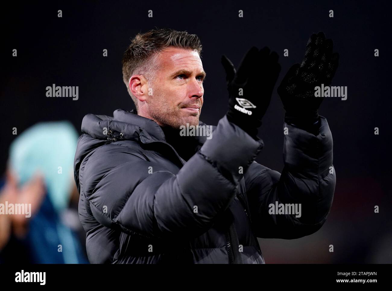 Luton Town manager Rob Edwards applauds the fans at the end of the ...
