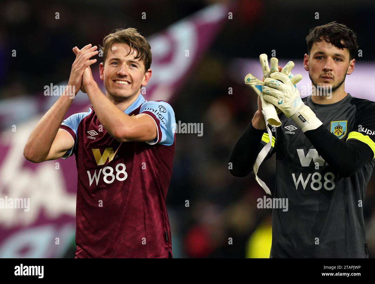 Burnley's Sander Berge (left) and goalkeeper James Trafford applaud the ...