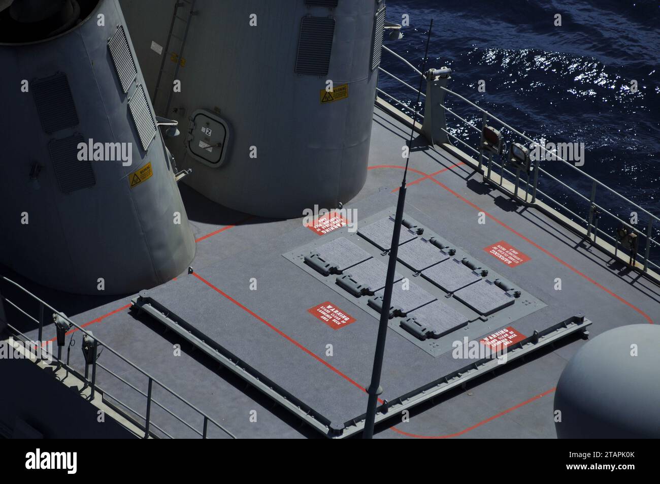 An elevated, close up view of missile launch lids on an Australian navy ...