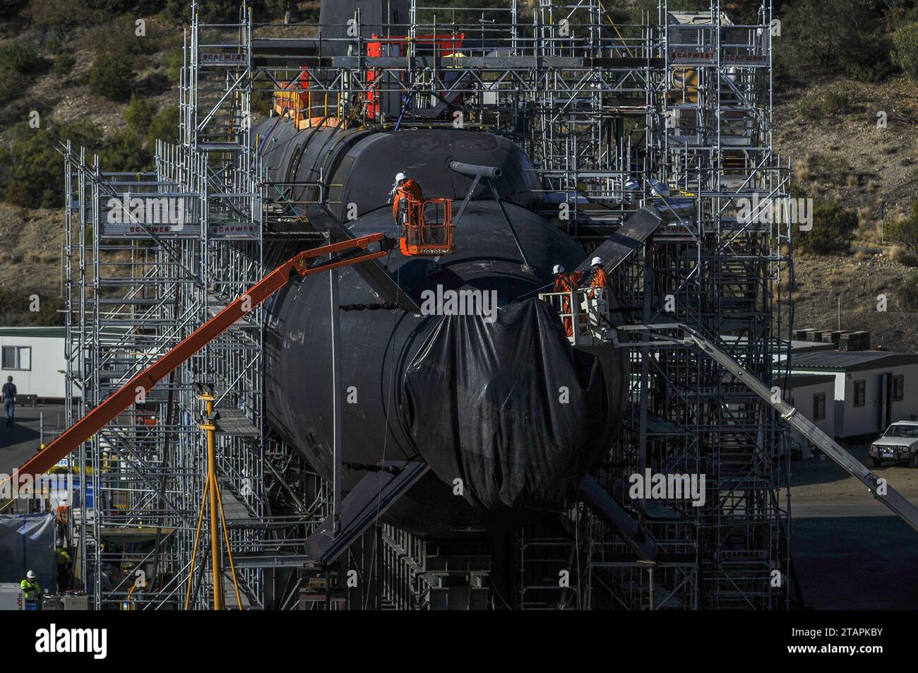HMAS Rankin, a Royal Australian Navy Collins class submarine surrounded ...