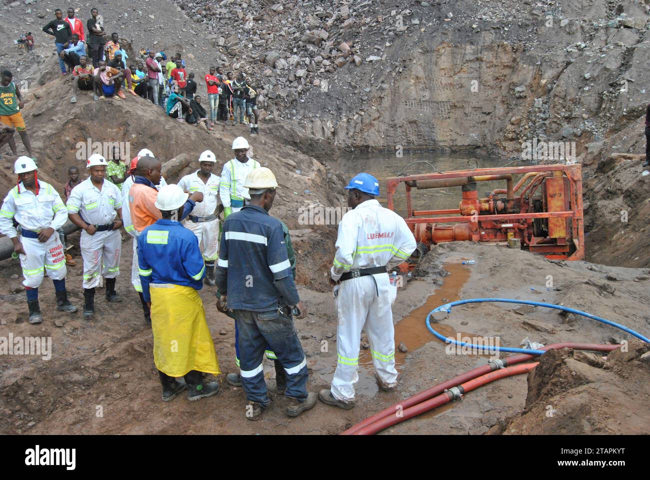 Mine workers are seen during a rescue mission in Chingola, around 400 ...