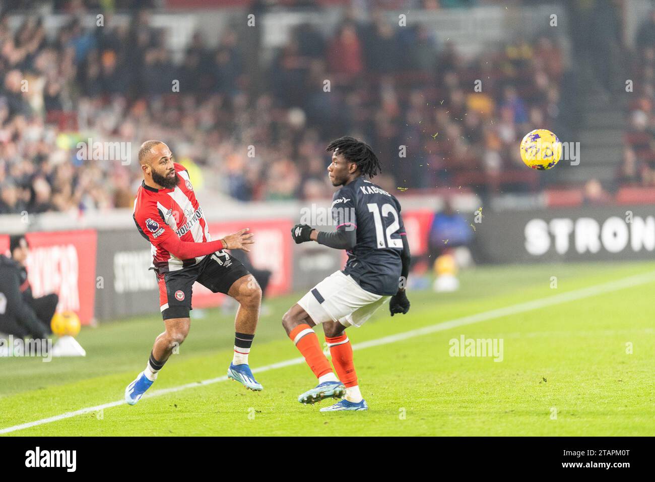 ]b19 “(left) takes on Issa Kaboré of Luton Town during the Premier ...
