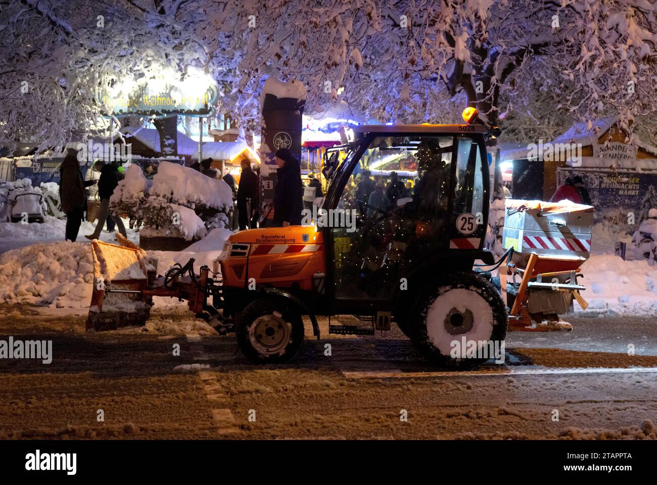 Munich, Germany. 02nd Dec, 2023. A snow plow clears the road in front ...