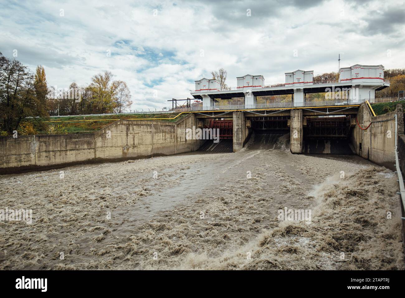 Spillway in Maykop dam, dirty water in river Stock Photo - Alamy